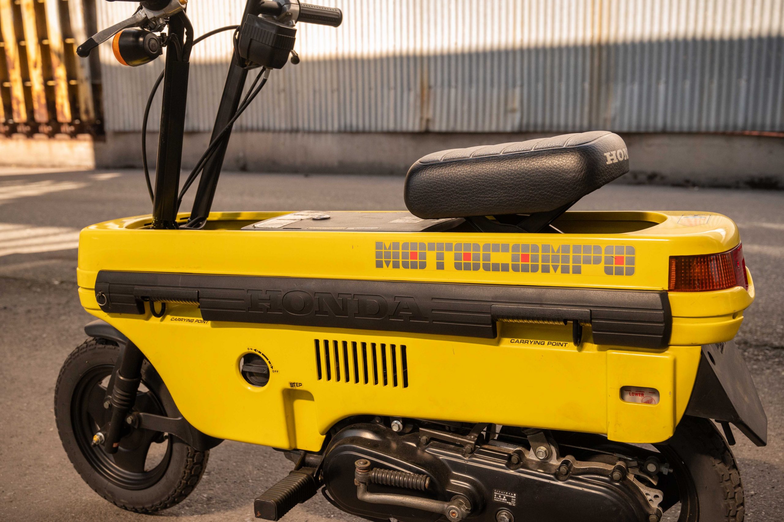 1982 Honda Motocompo - yellow | AdamsGarage - SODO-MOTO