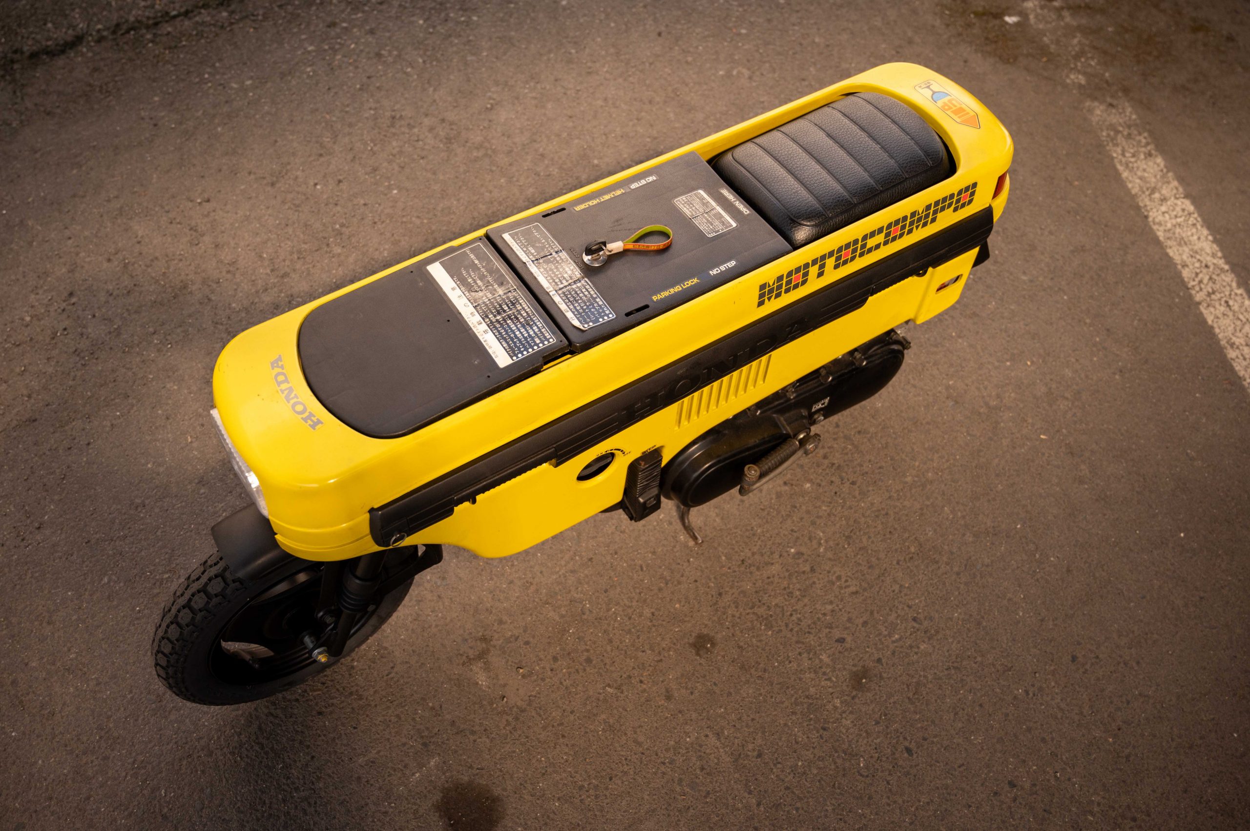 1982 Honda Motocompo - yellow | AdamsGarage - SODO-MOTO